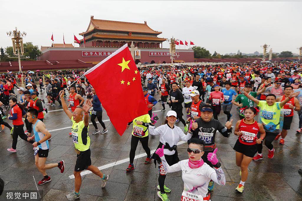 english news 英语新闻-Beijing marathon an encouraging sign