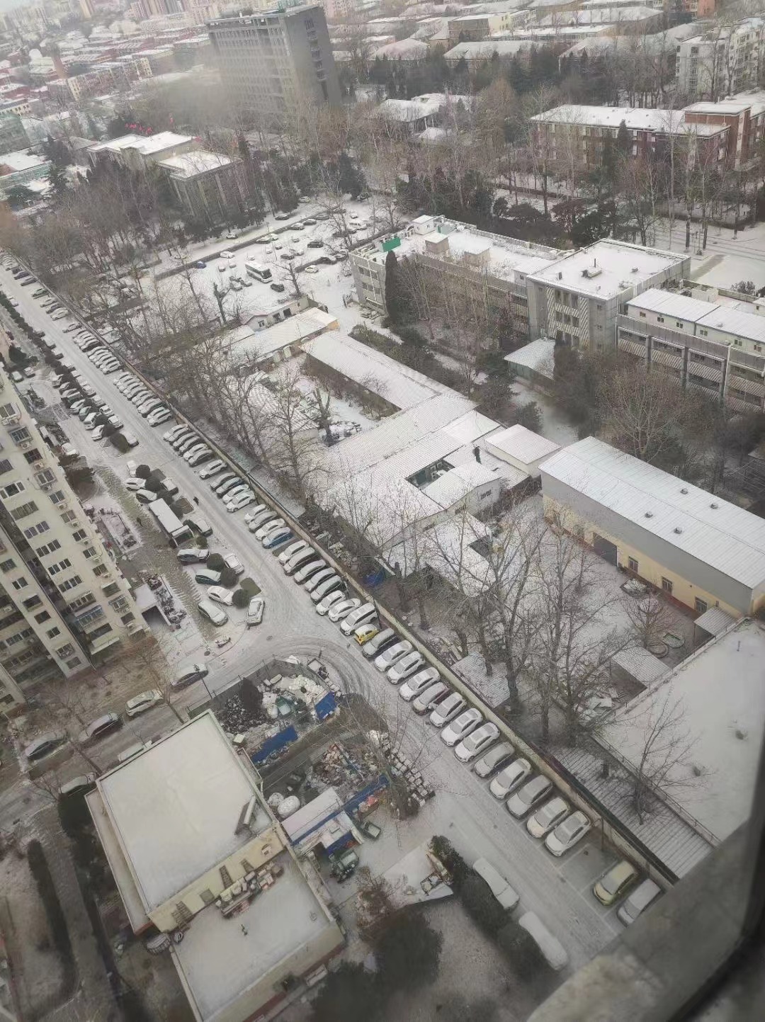 english news 英语新闻-Beijing embraces first snow in the Year of the Rabbit