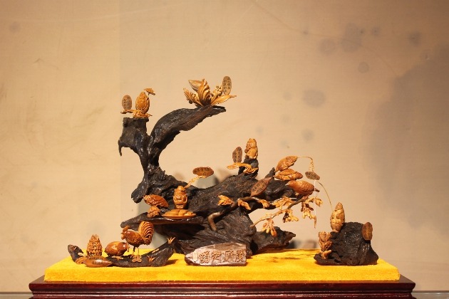 Specialist in Haizhu promotes Guangzhou olive carving techniques ...