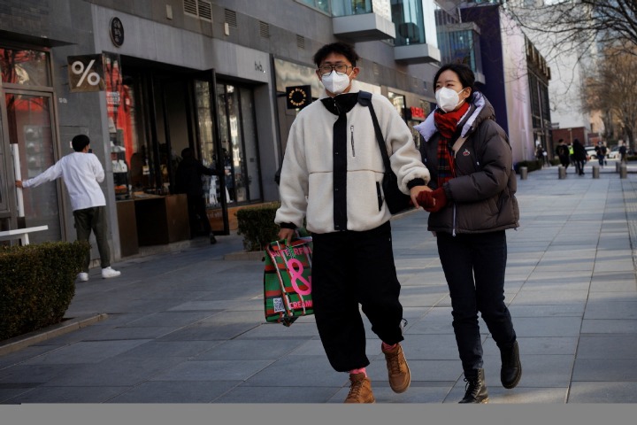 Experts: Public mask wearing can be eased - Chinadaily.com.cn