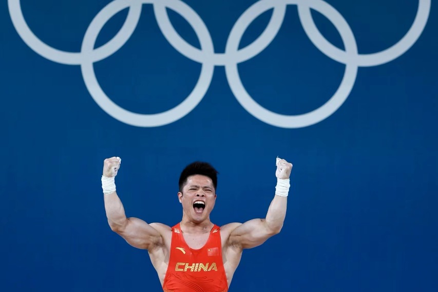 China's Li Fabin retains Olympic weightlifting title, sets record ...