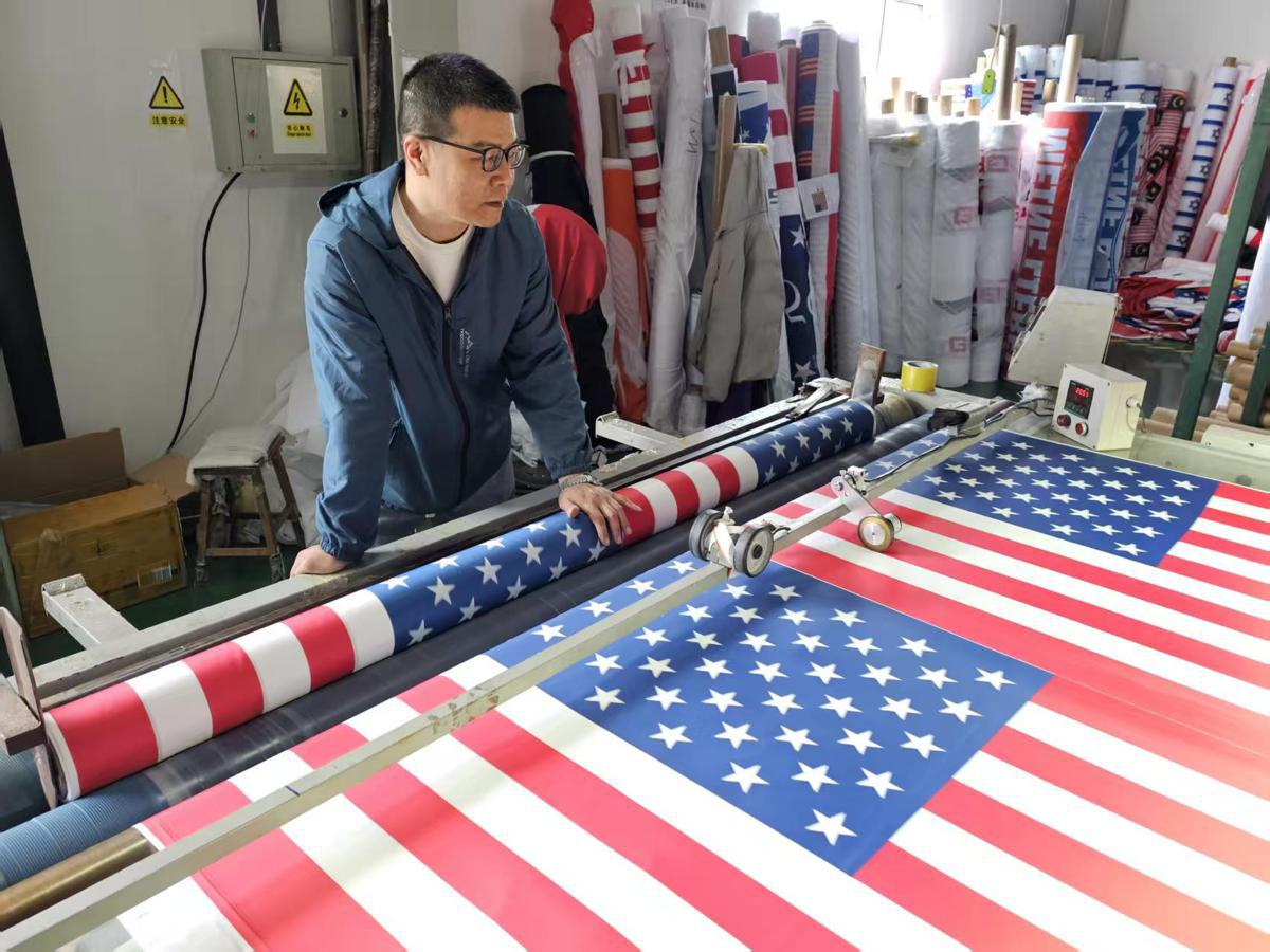 Qingdao flag maker ramps up production to fill World Cup orders ...